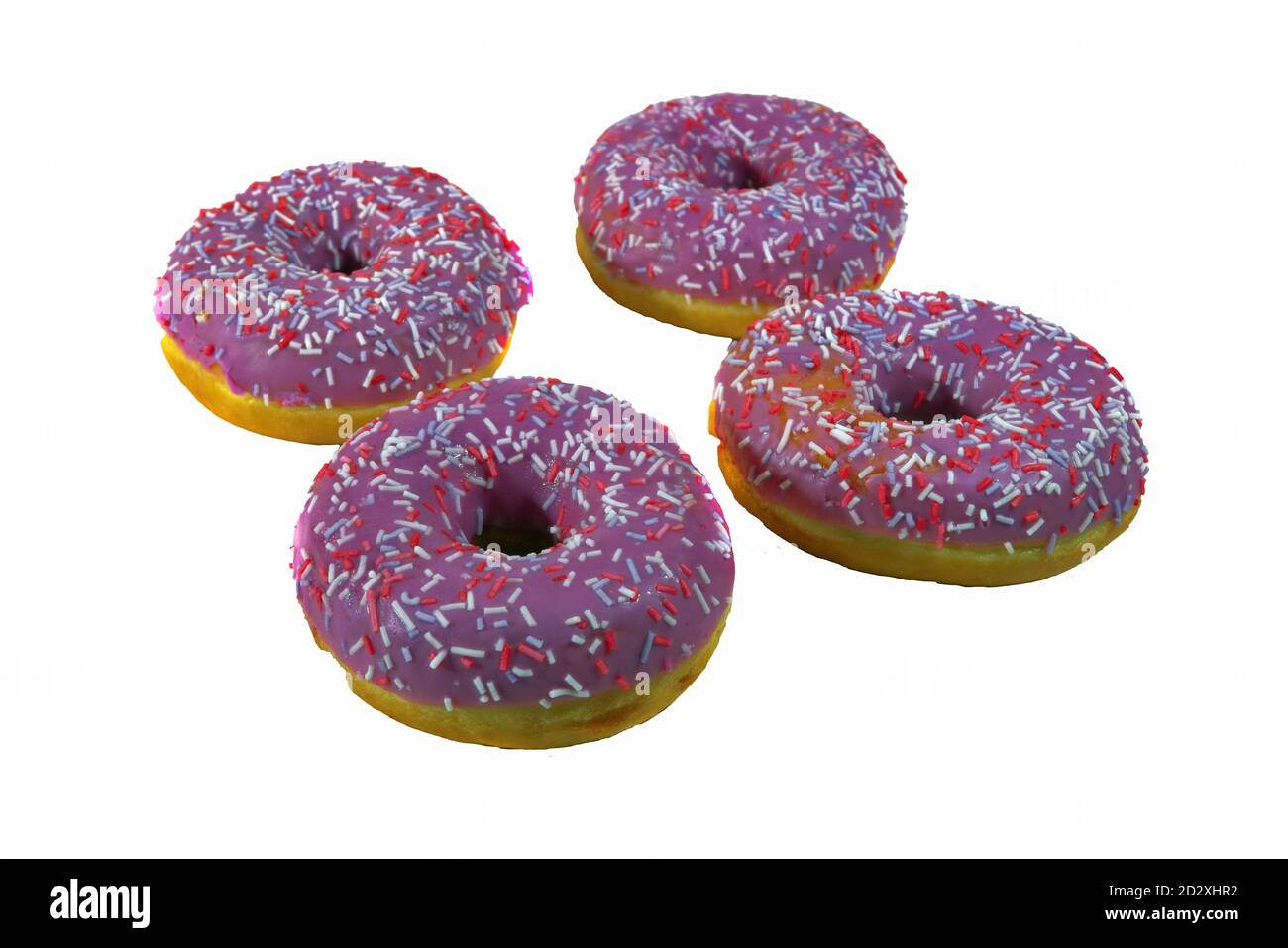 Four donuts with sprinkles isolated on white background top view Stock ...