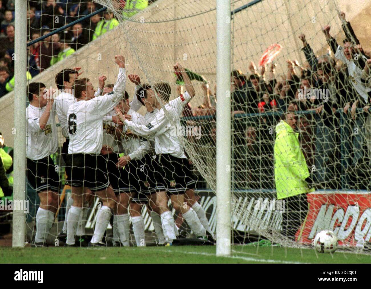 The Wrexham team celebrates after scoring one of the three goals whioch ...