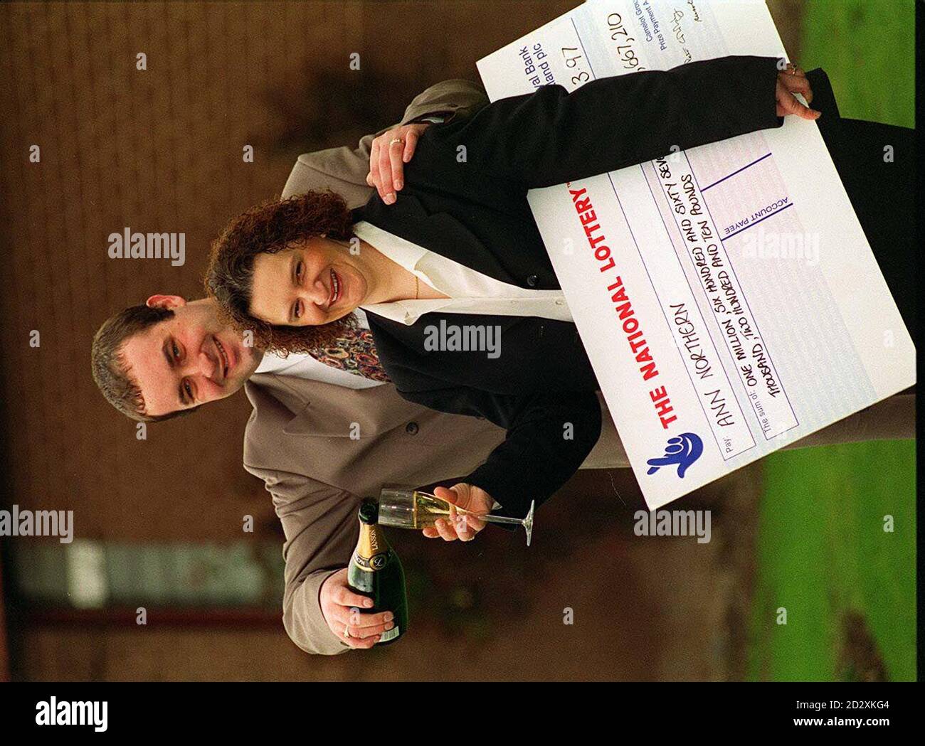 Ann Northern from Leicester with her Lottery cheque for 1.6M celebrates ...