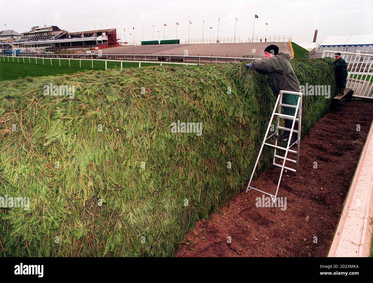 The final touches are added at the Chair fence on the Aintree Grand ...