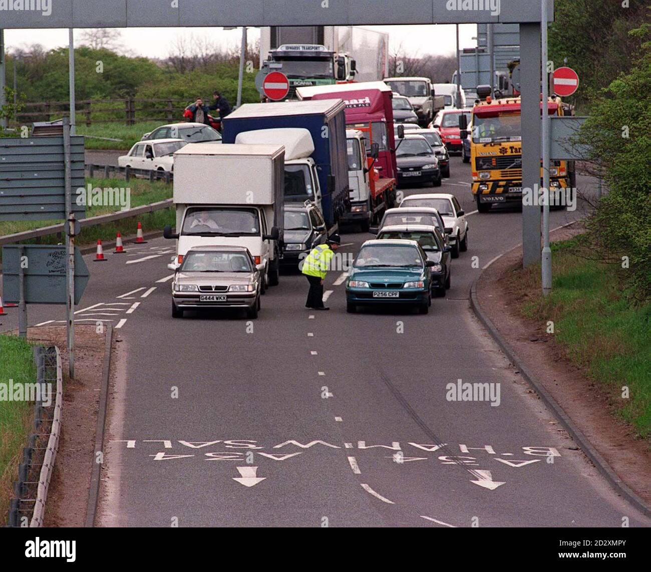 Police divert traffic queues off the M6 motorway at Junction 7 north of ...
