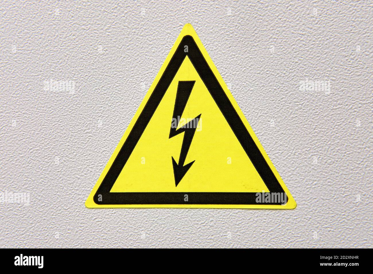 Yellow electrical hazard sign. Danger symbol with electric lightning ...