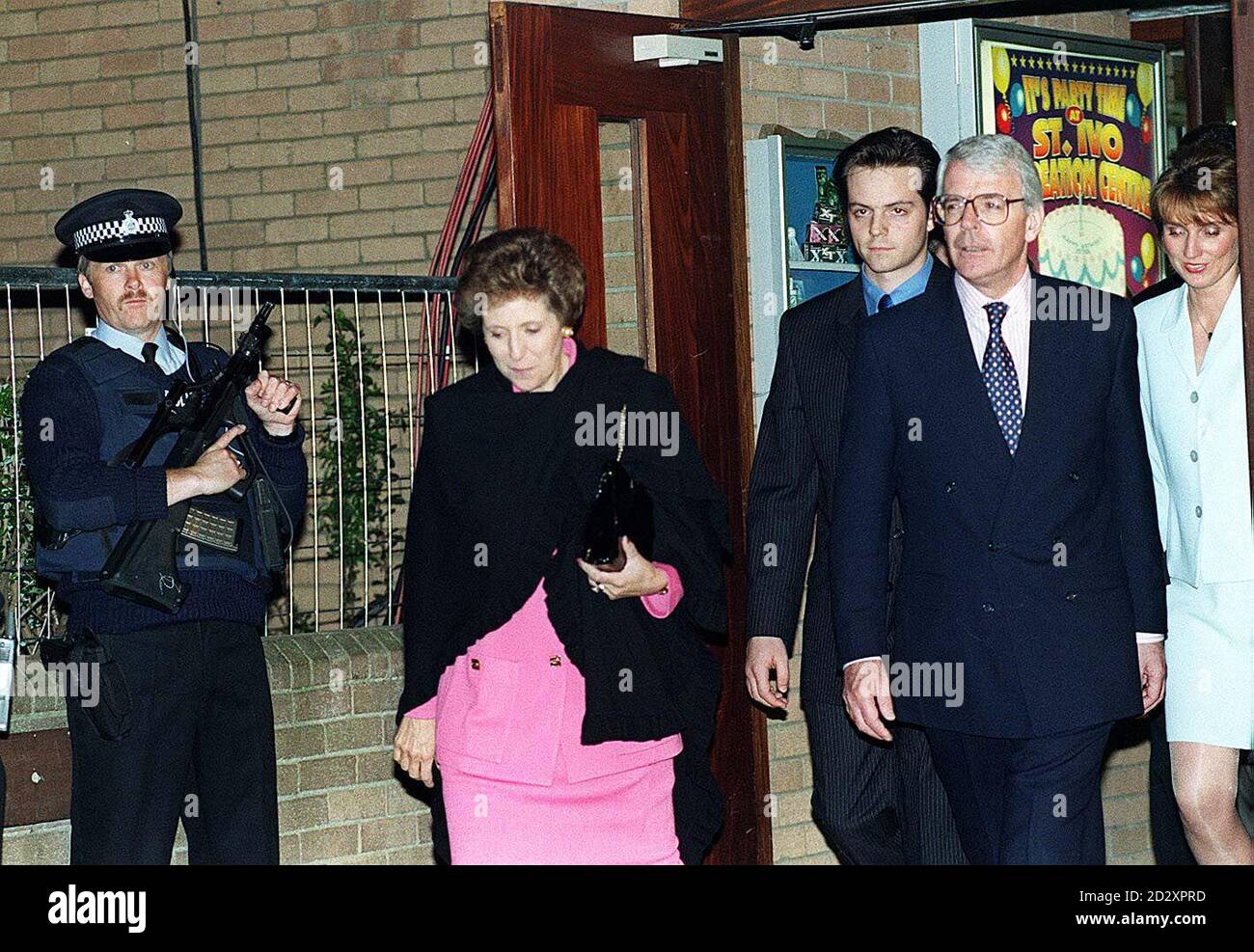 John Major and his family leave the St. Ivo's centre in St. Ives today ...
