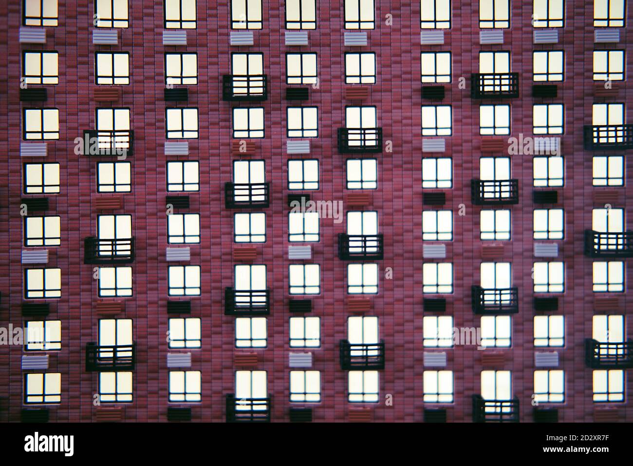 Wall of a brown house in the evening, background. Building facade model ...