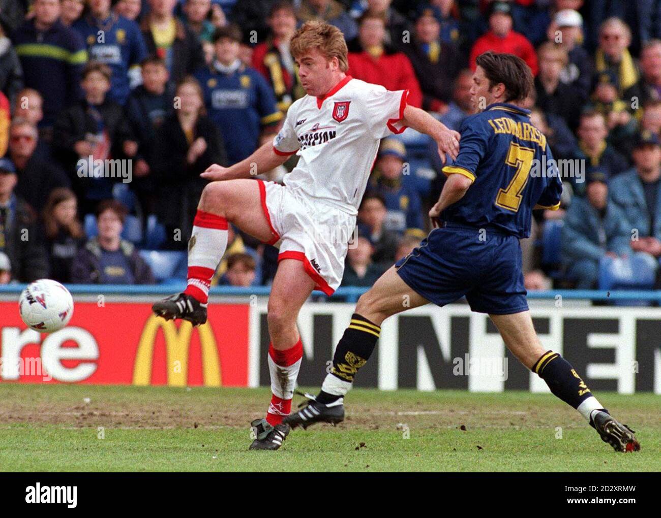Sunderland's Gareth Hall gets to the ball ahead of Wimbledon's Oyvind ...