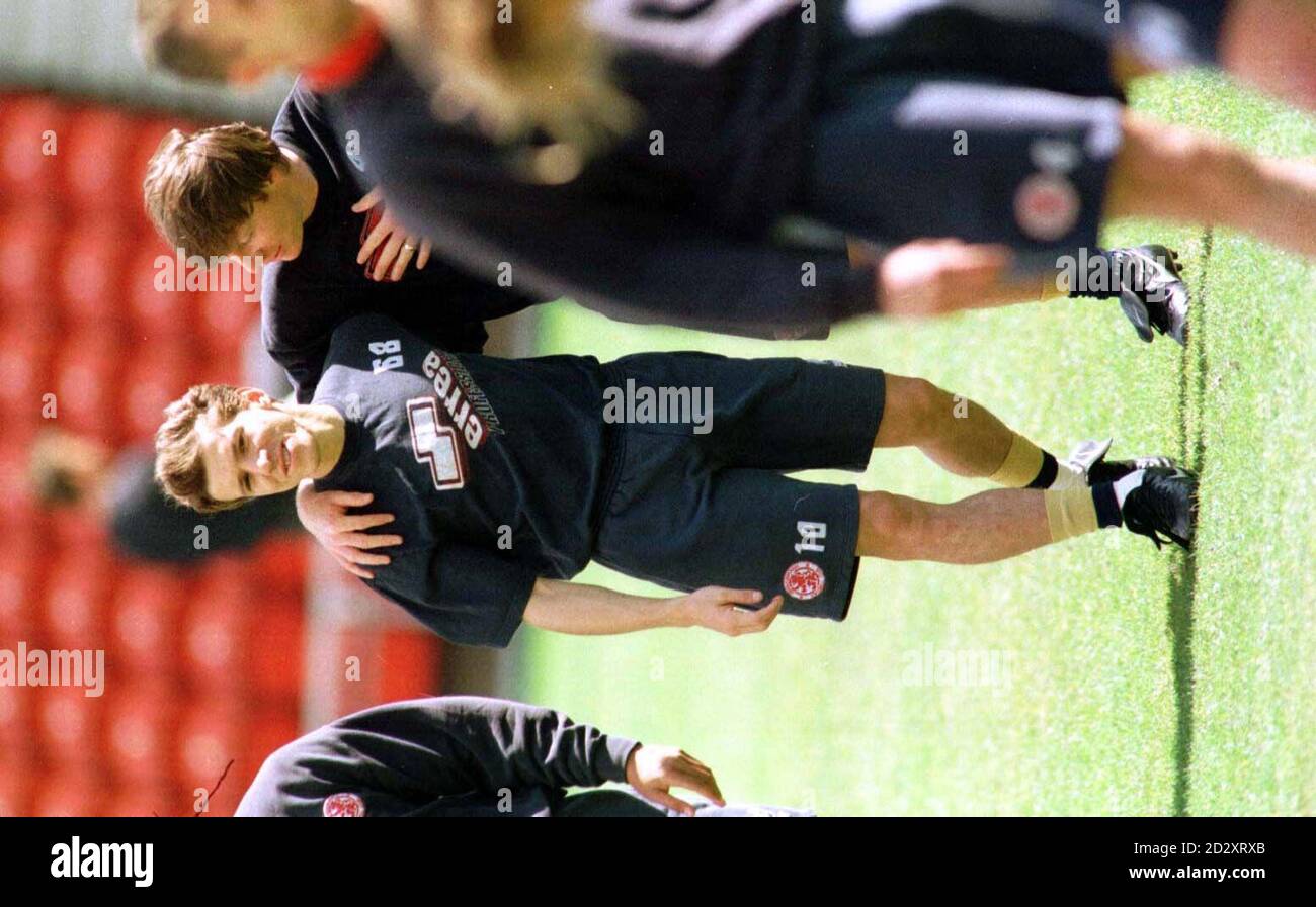 Middlesbrough's Craig Hignett (right) has a quiet word with Brazilian ...