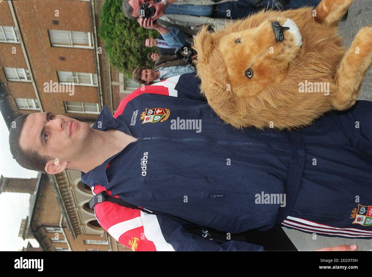 Carrying team mascot hi-res stock photography and images - Alamy