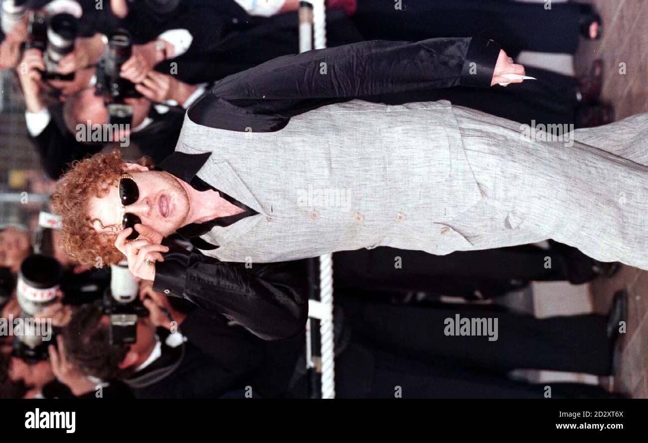 Simply Red singer Mick Hucknall arrives for a screening of The Serpent ...