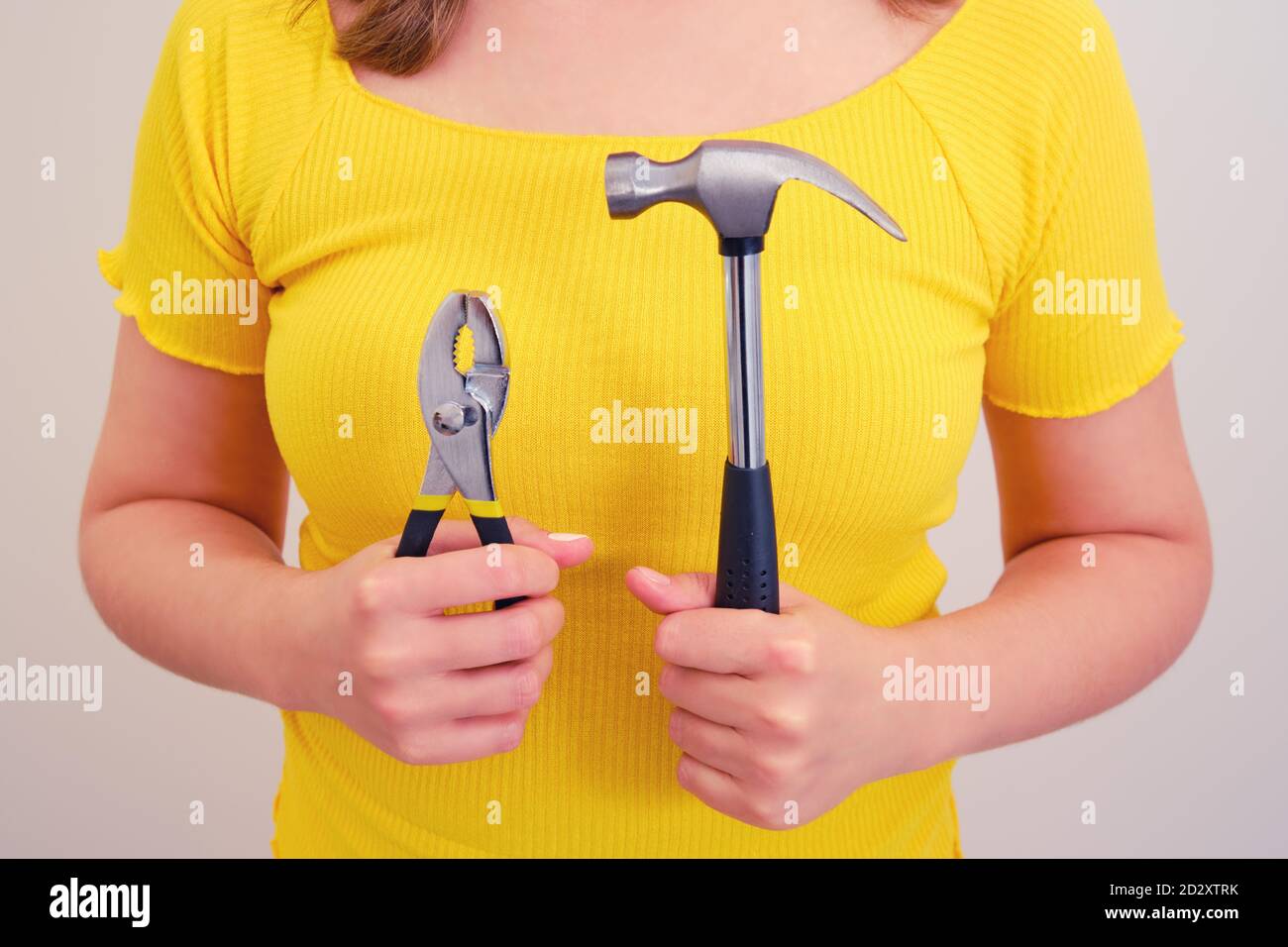 Hands woman using hammer hi-res stock photography and images - Alamy
