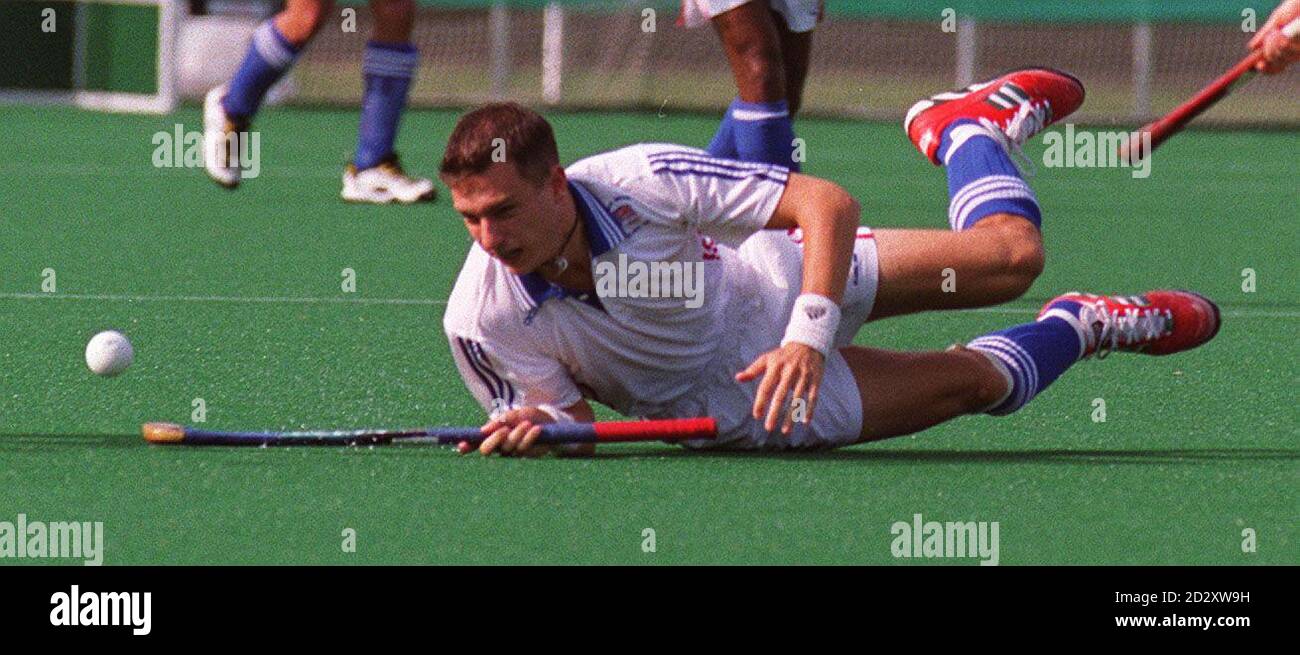 British forward David Hall hits the deck during their Olympic match at ...