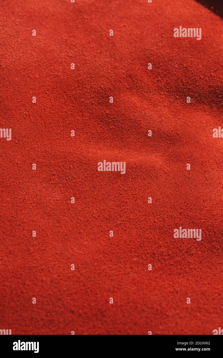 Red matte background of suede fabric, closeup. Velvet texture of ...