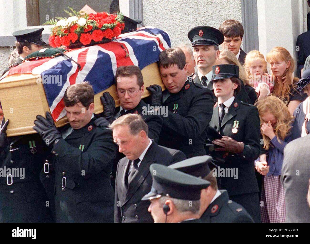Scene of sorrow as RUC officers carry the coffin of colleague Officer ...