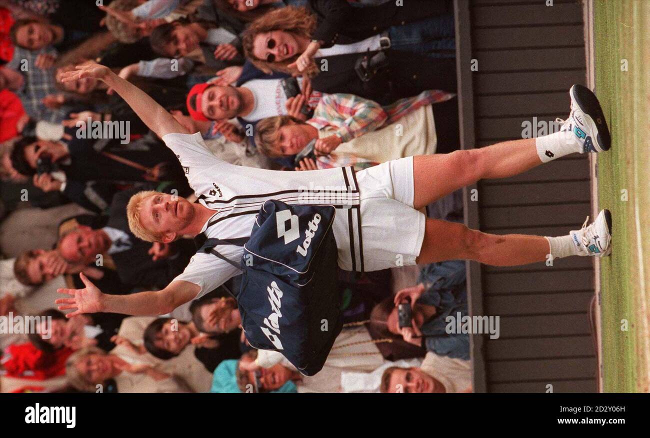 Boris Becker waves goodbye to the Centre Court after losing to Pete ...