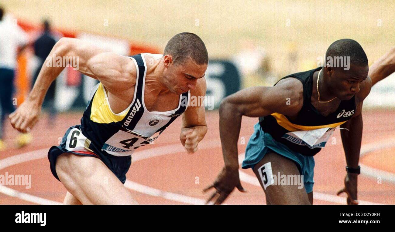 Ian Mackie (left) powers off the blocks to win Heat 1 of the Men 100 ...