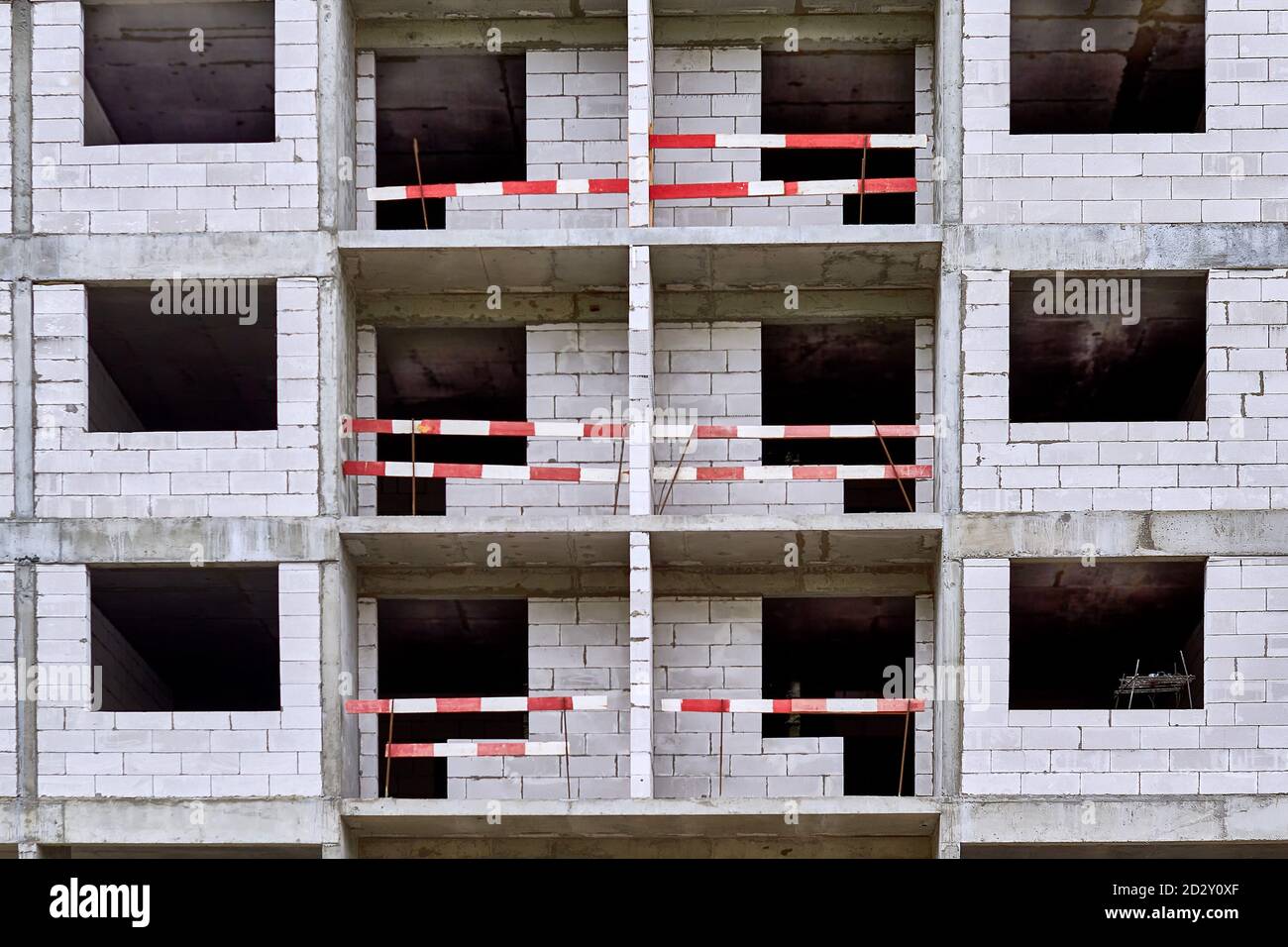 The facade of the unfinished panel building of concrete blocks Stock ...