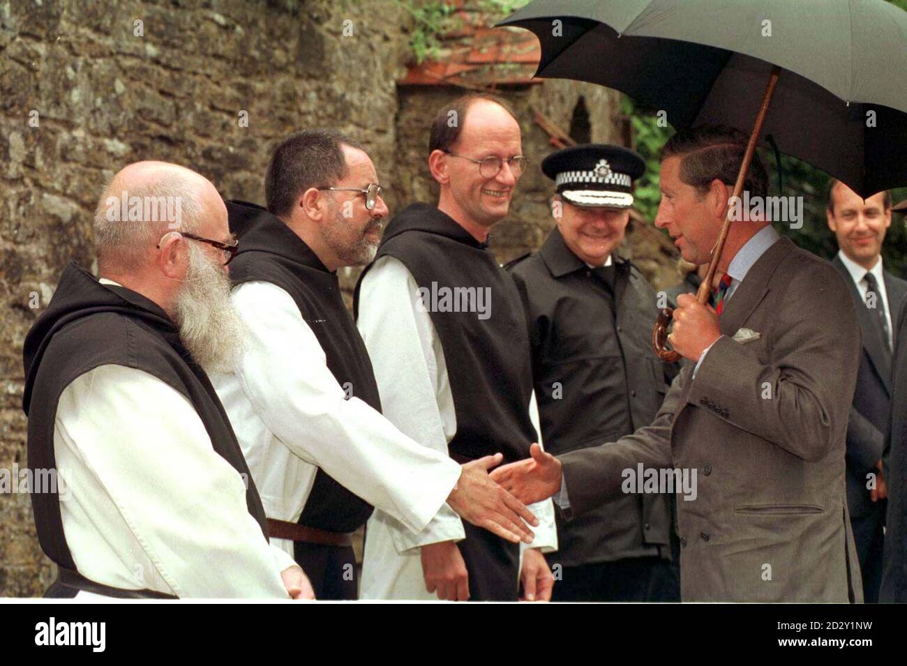 HRH The Prince of Wales meets monks (from left) Father Robert, Brother ...