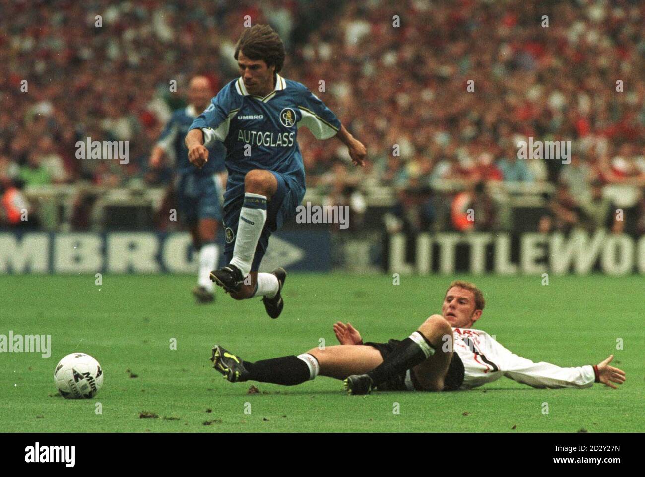 Chelseas Gianfranco Zola Leaps Over An Outstretched Nicky Butt During Todays Sun Charity
