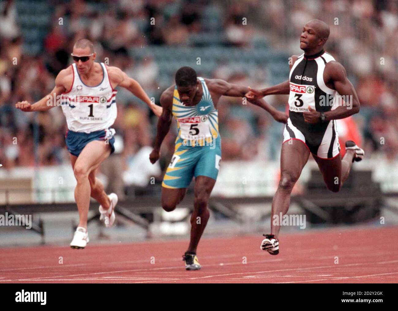 Canada's Donovan Bailey (3) ahead of Ian Mackie (1) and Dwain Chambers ...