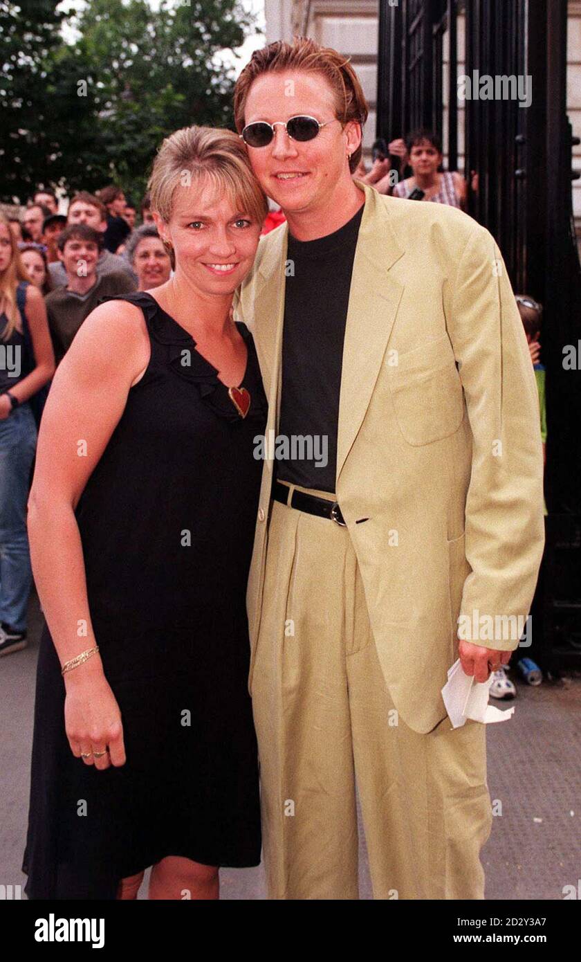 DJ Simon Mayo and his wife arriving for a reception at No.10 Downing St ...