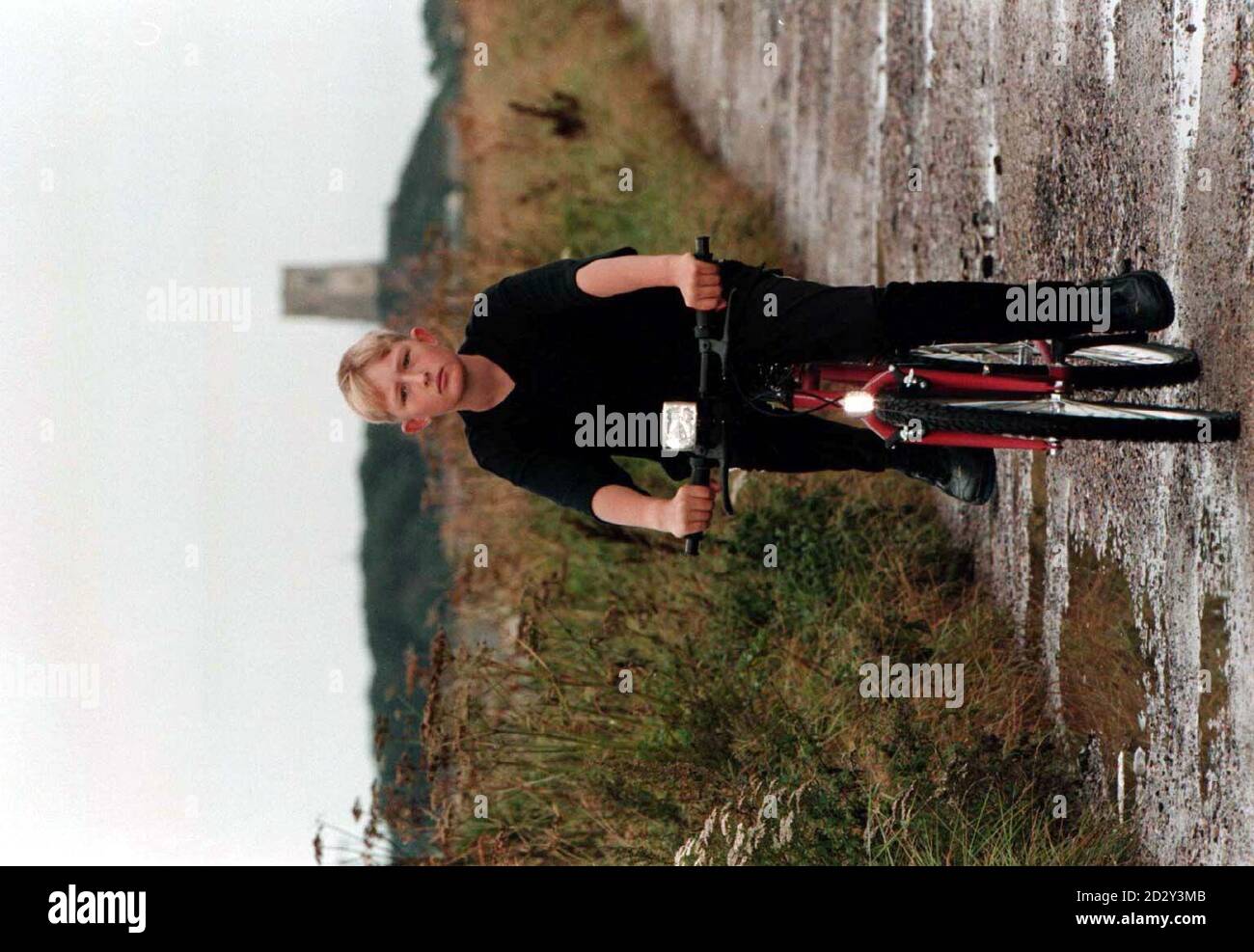 A policeman's thirteen-year-old son, Peter Lovewell, wearing clothes ...