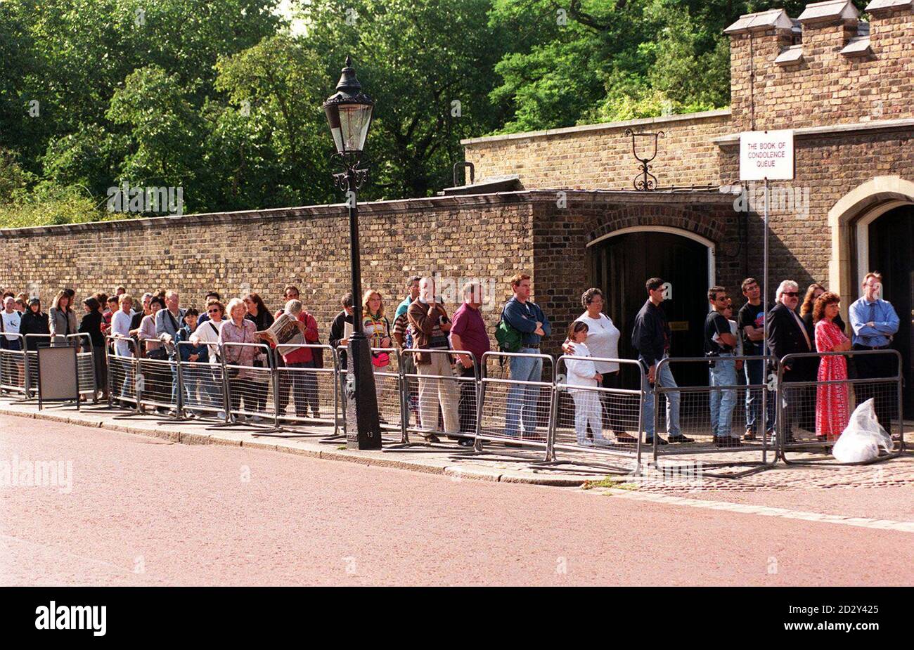 The ever extending queue of people waiting to sign the condolences book ...