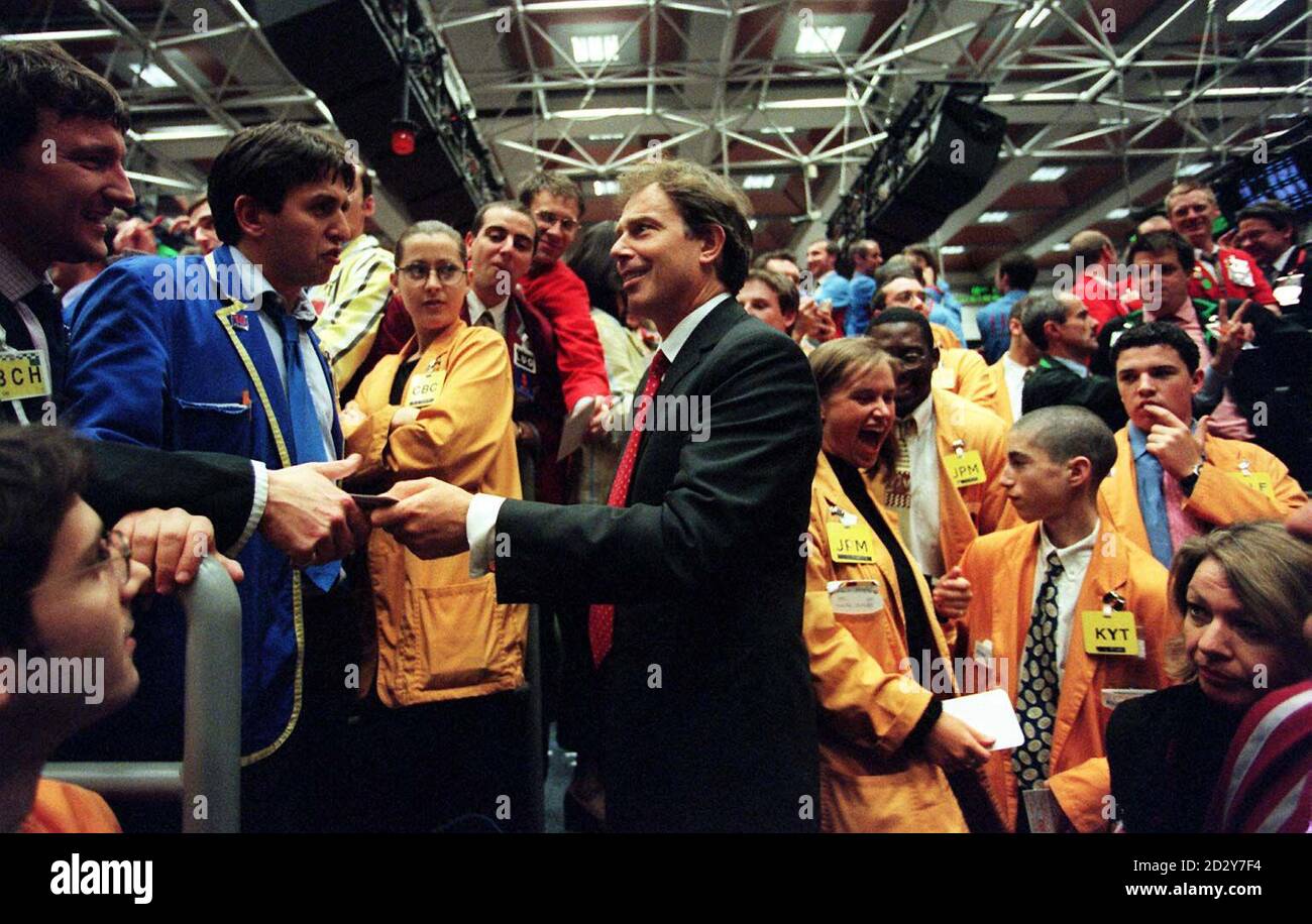 Prime Minister, Tony Blair (centre) with traders in the pit at the ...
