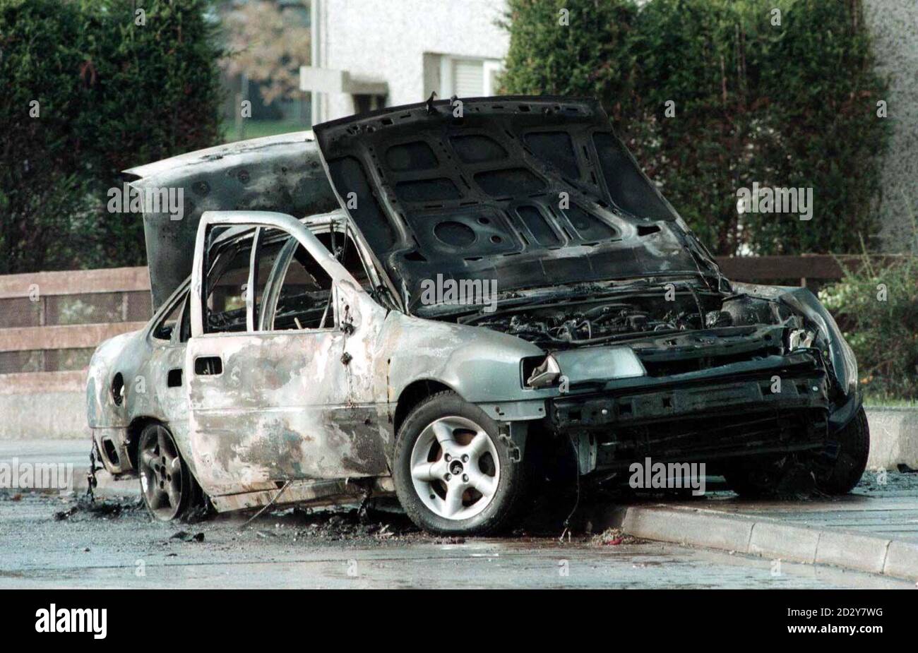 The remains of the Vauxhall Cavalier after a car bomb exploded in the ...