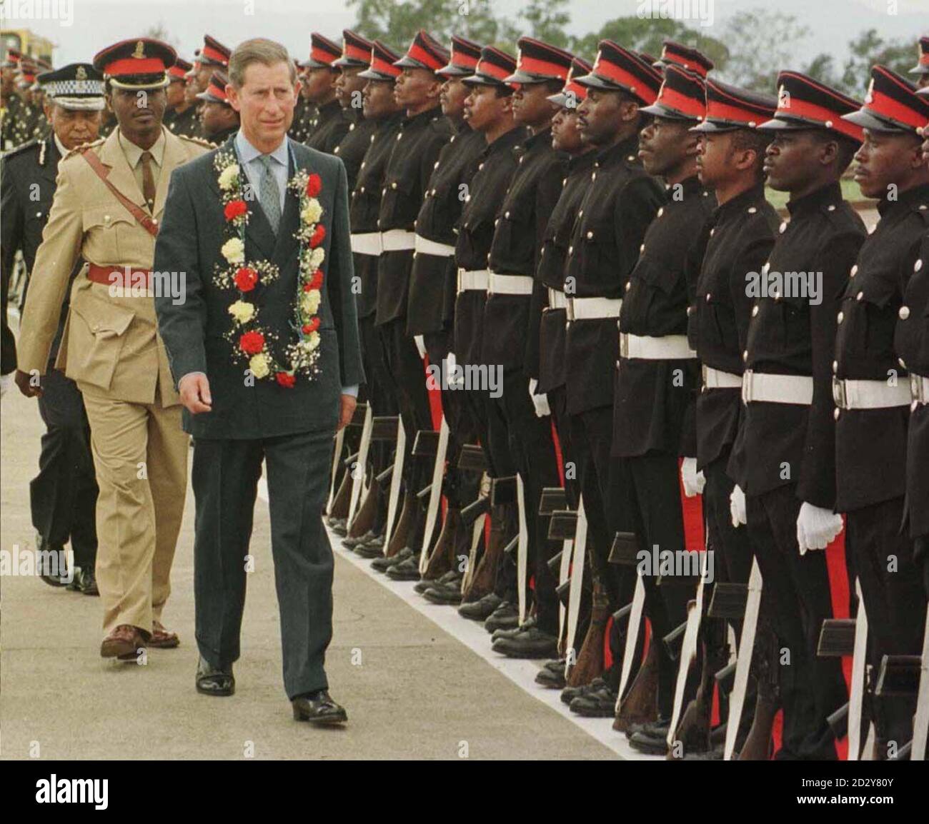 The Prince of Wales inspects the guard of honour, after his arrival at ...