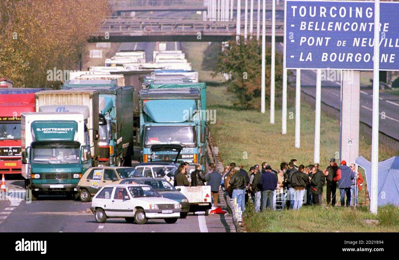 French lorry drivers blockade the French motorway at Bondues inside the ...