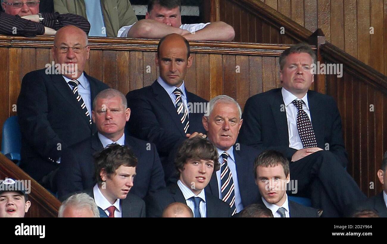 Ranger's new owner Craig Whyte in the directors box with Walter Smith ...