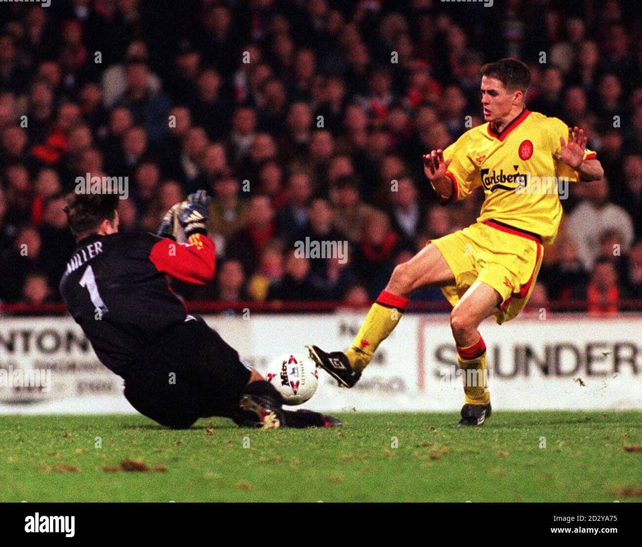 Liverpool's Michael Owen goes for goal Crystal Palace keeper Kevin ...