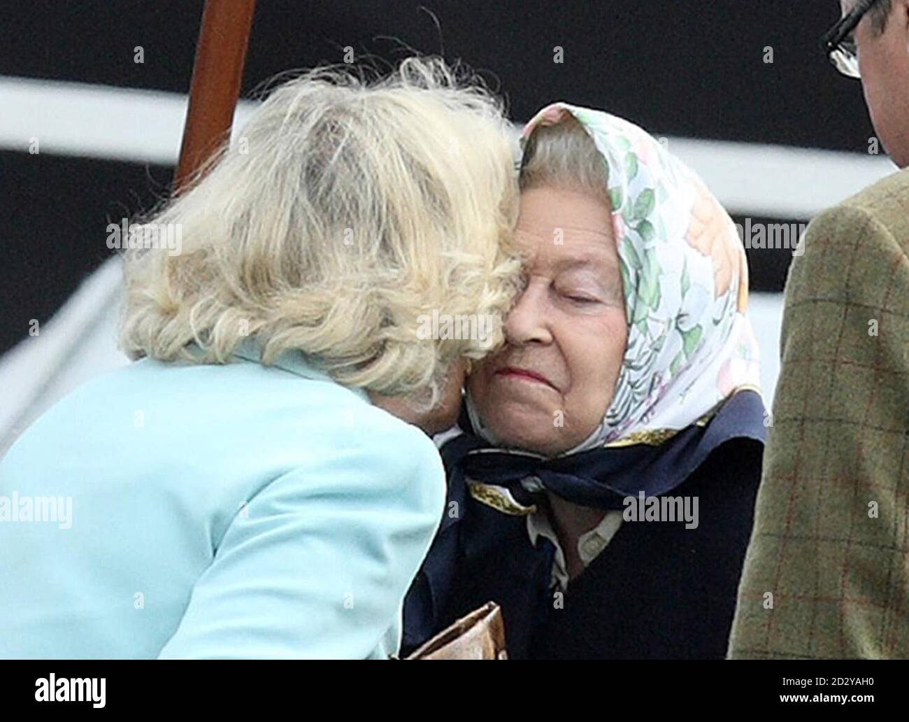 Queen Elizabeth II greets the Duchess of Cornwall as they attend the ...