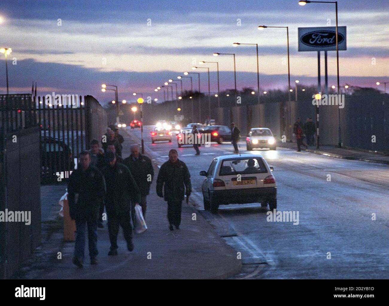 Early morning shift workers arrive at the Ford Halewood plant in ...