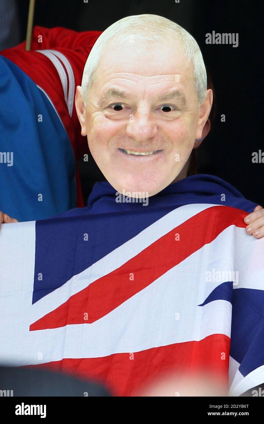 A Rangers fan wears a Walter Smith mask Stock Photo - Alamy