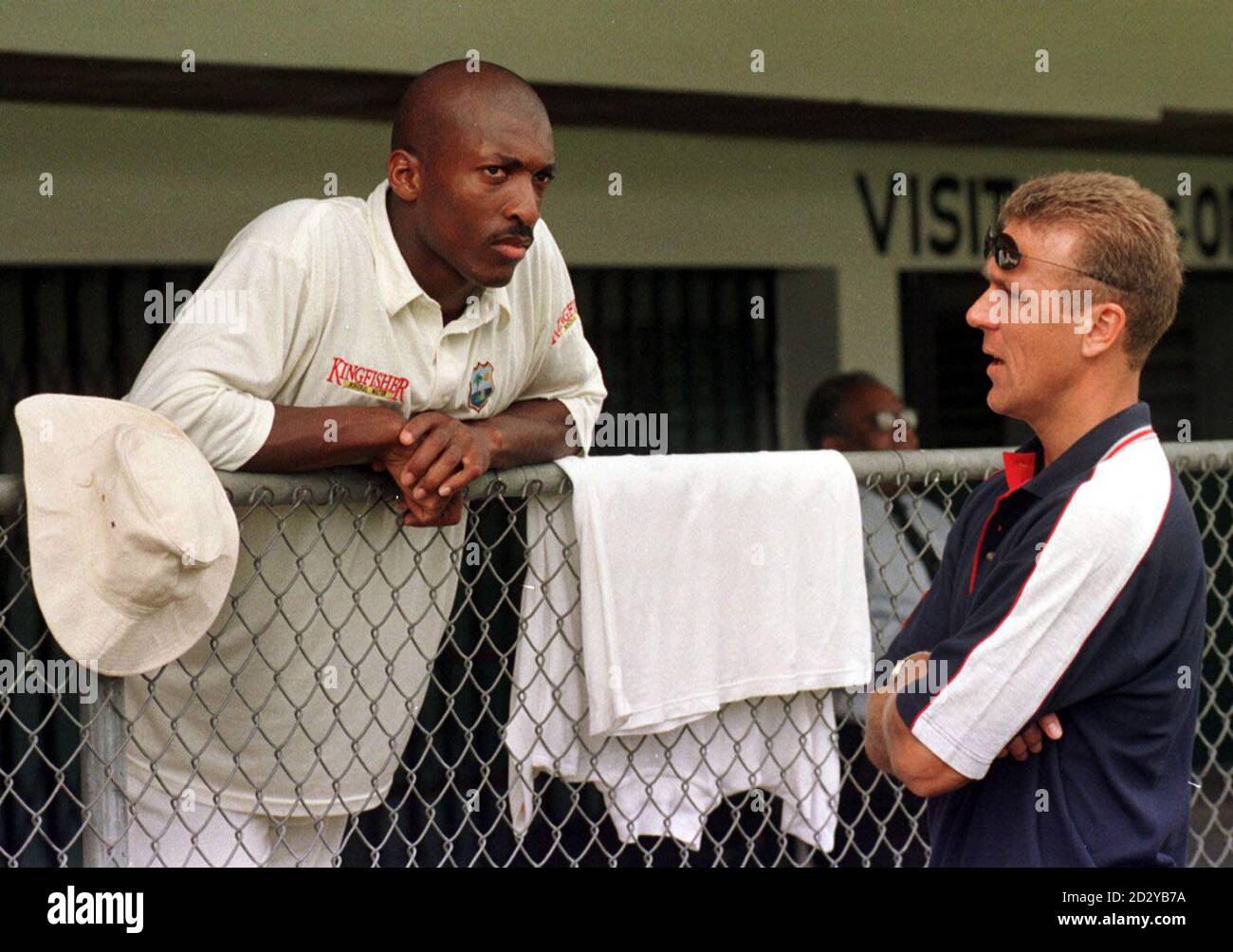 England batsman Alec Stewart (right) talks to West Indian fast bowler ...
