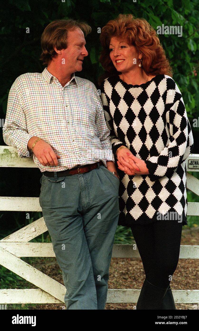 PA NEWS PHOTO 8/5/92 ACTOR DENNIS WATERMAN AND HIS ACTRESS WIFE RULA ...