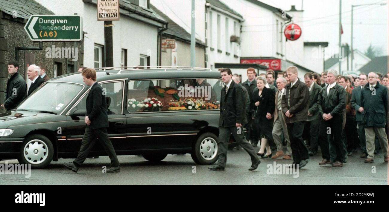 The funeral cortege of LVF murder victim Fergal McCusker makes its way ...