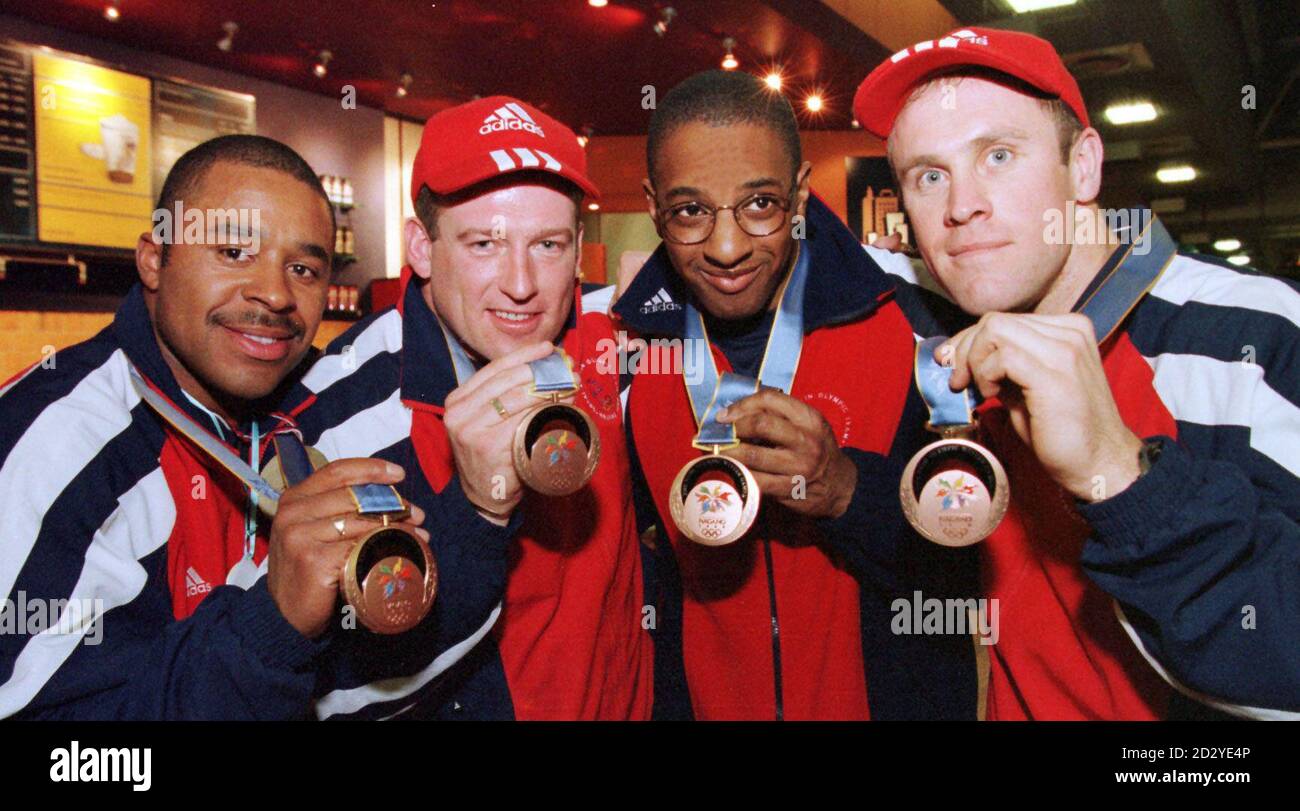 The jubilant British Bobsleigh Team arrive back at Heathrow Airport ...