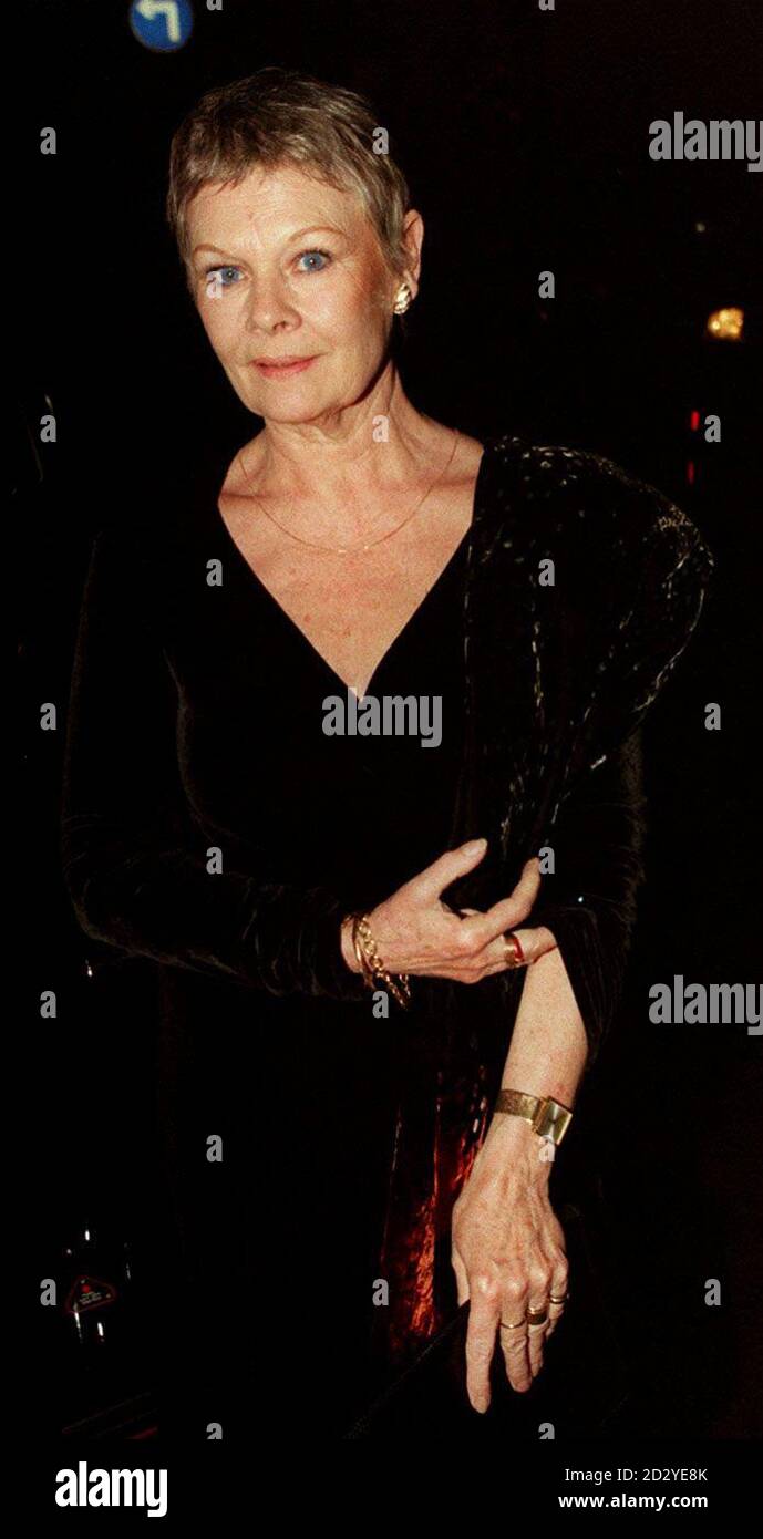 PA NEWS PHOTO 22/2/98 ACTRESS DAME JUDI DENCH ATTENDS SIR JOHN MILLS ...