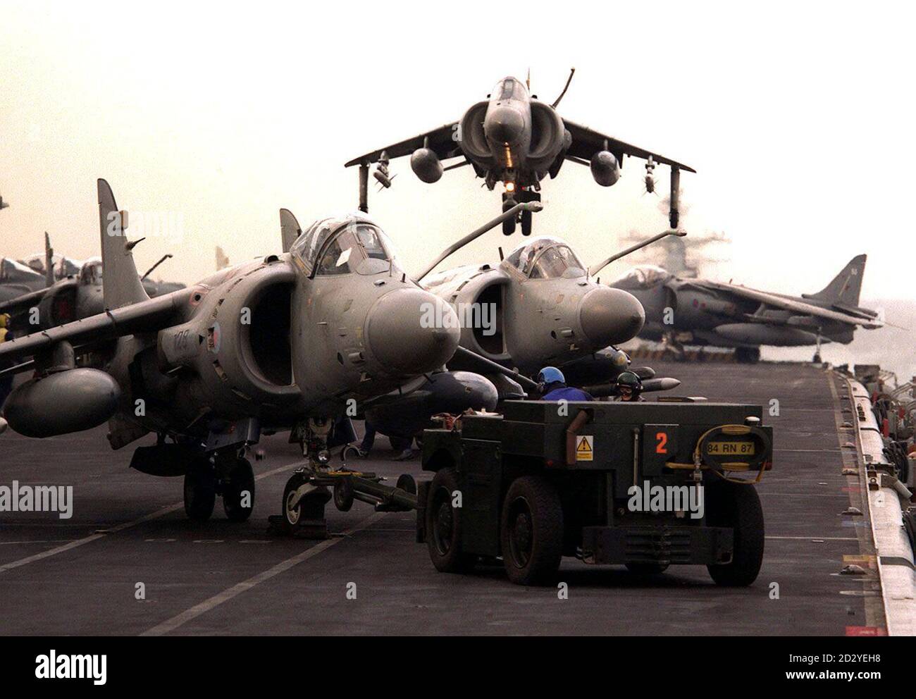 Sea Harriers return to the Roal Navy aircraft carrier HMS Invincible ...