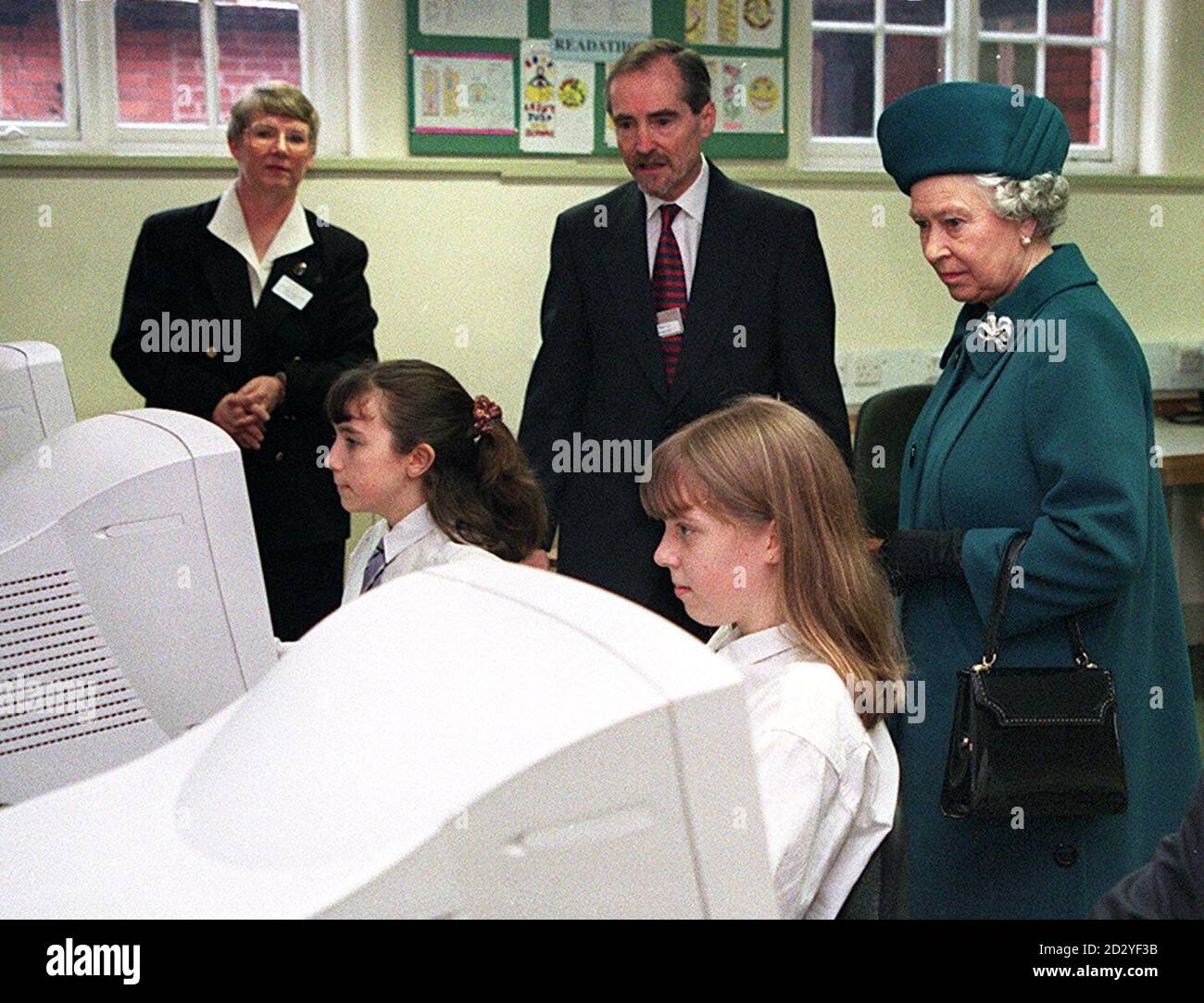 The Queen visIts a new computer room at Hawarden High, School, where ...