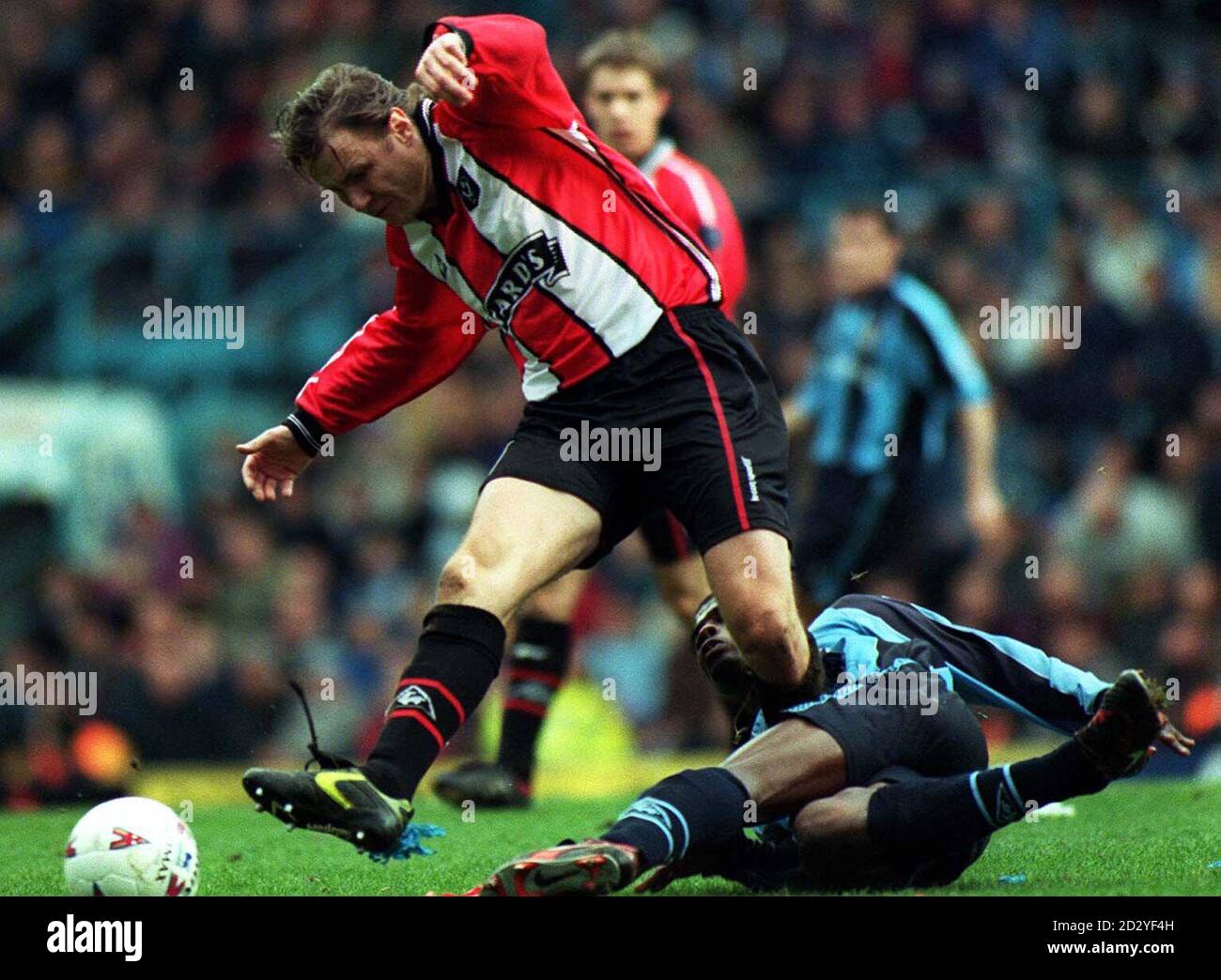 Coventry City's George Boateng brings down Sheffield United's Lee ...