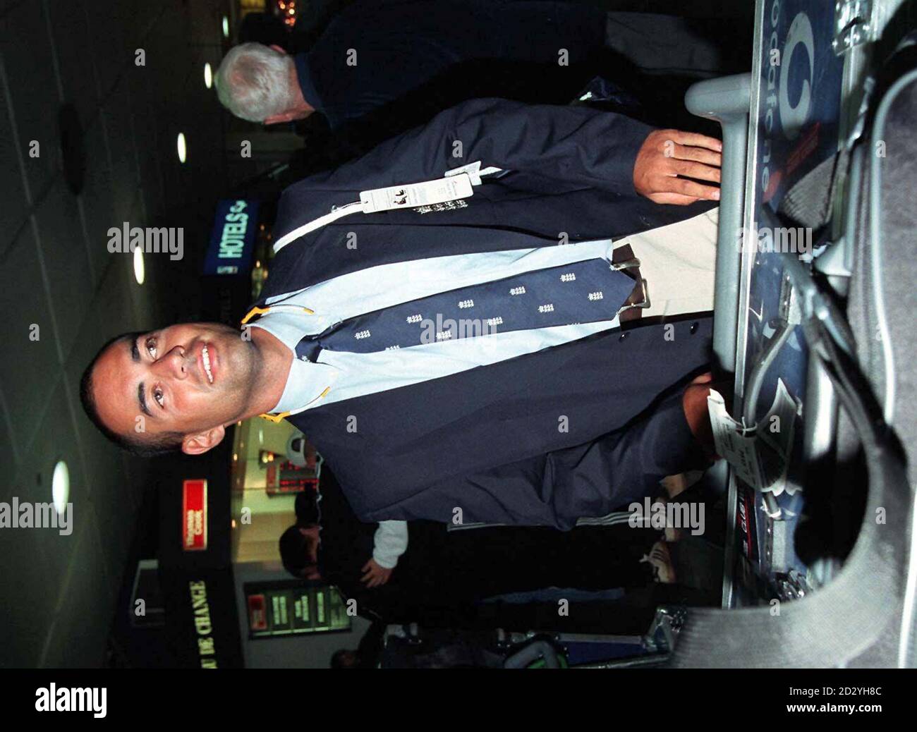 England Cricketer Adam Hollioake arriving at Gatwick Airport this ...