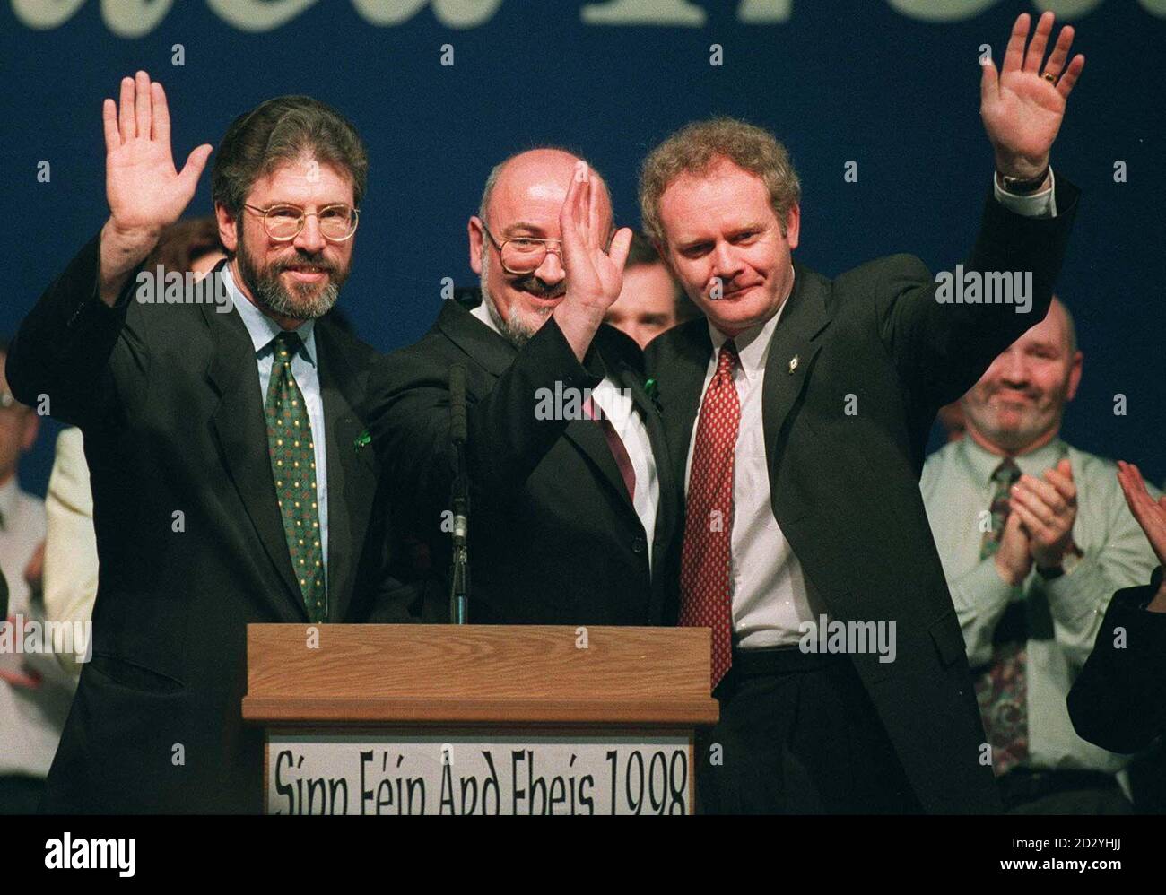 President Sinn Fein President Gerry Adams takes the applause with ...