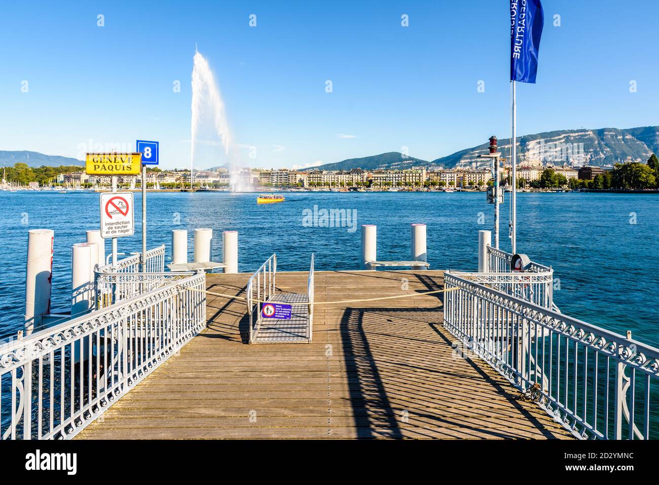 The bay of Geneva, Switzerland, seen from a jetty with the water jet ...