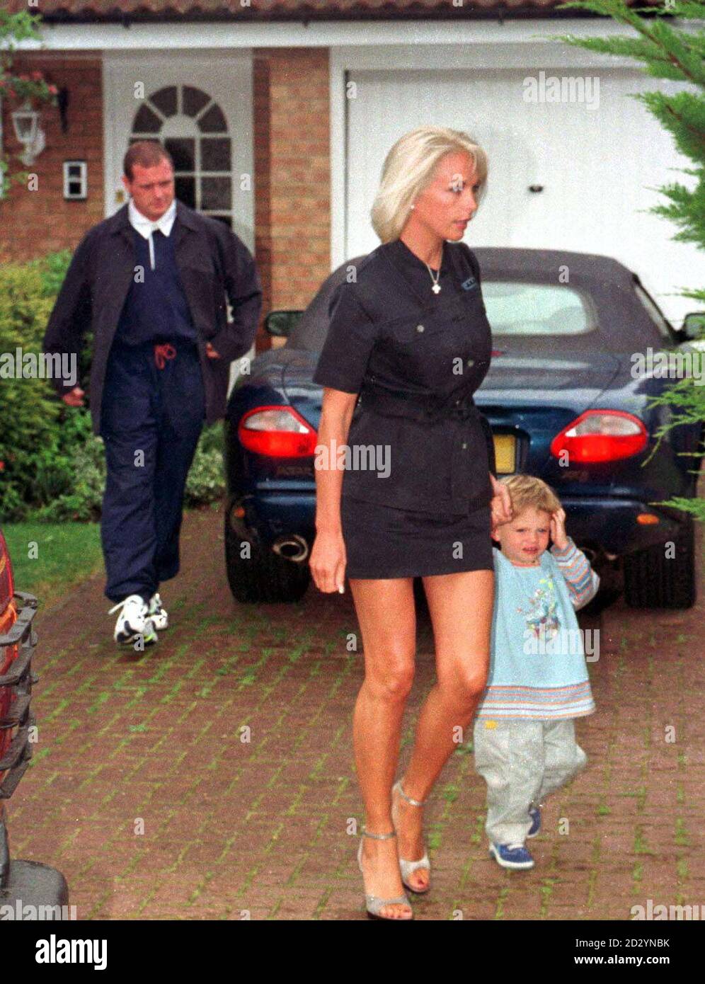 England soccer player Paul Gascoigne leaving the Stansted Abbots home ...