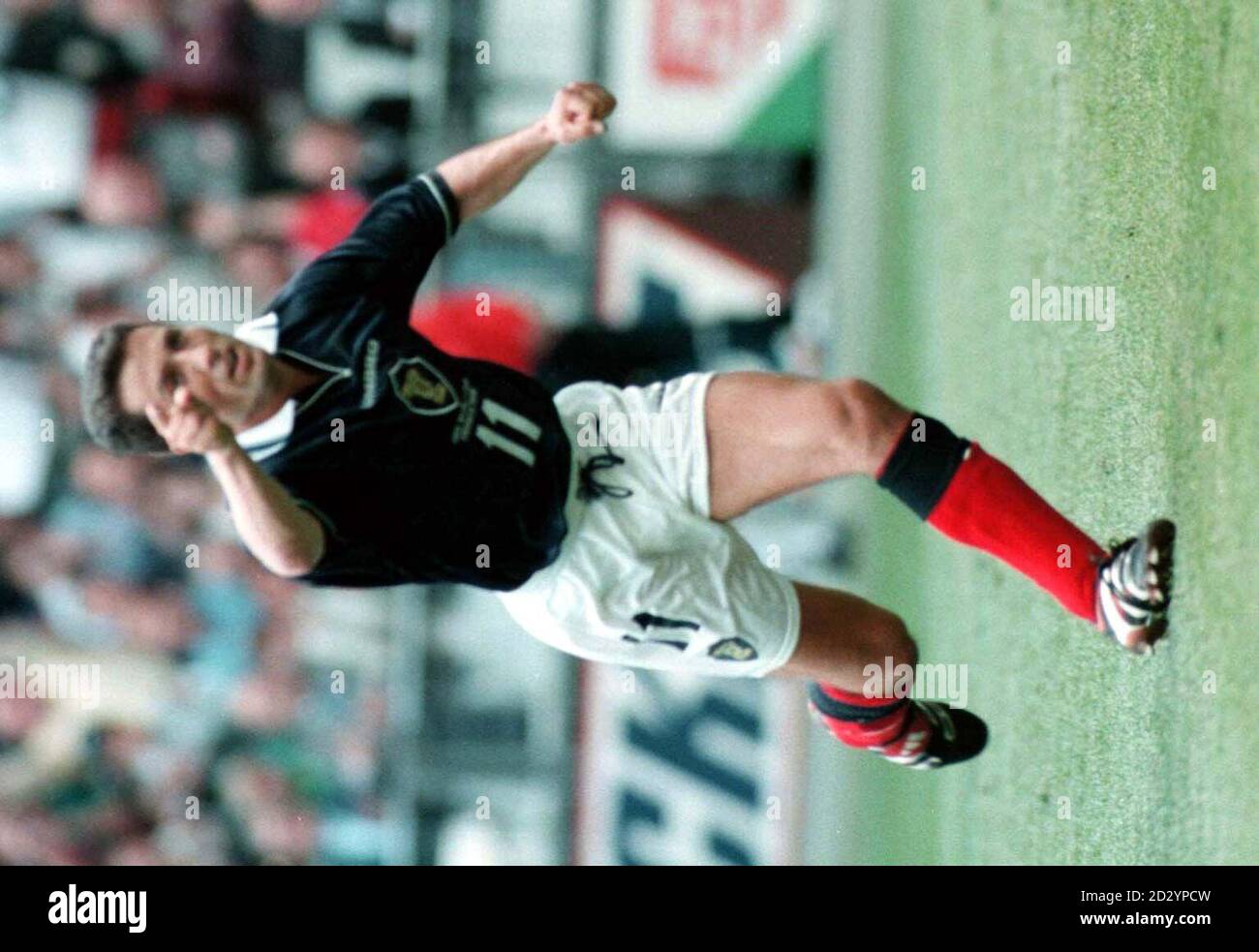 John Collins of Scotland celebrates his penalty against Brazil in today ...