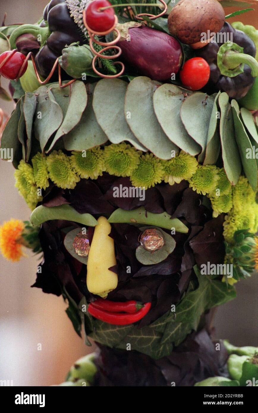THE HEAD OF A LIFE-SIZE FIGURE MADE FROM FRUIT AND VEGETABLES BY TOM ...