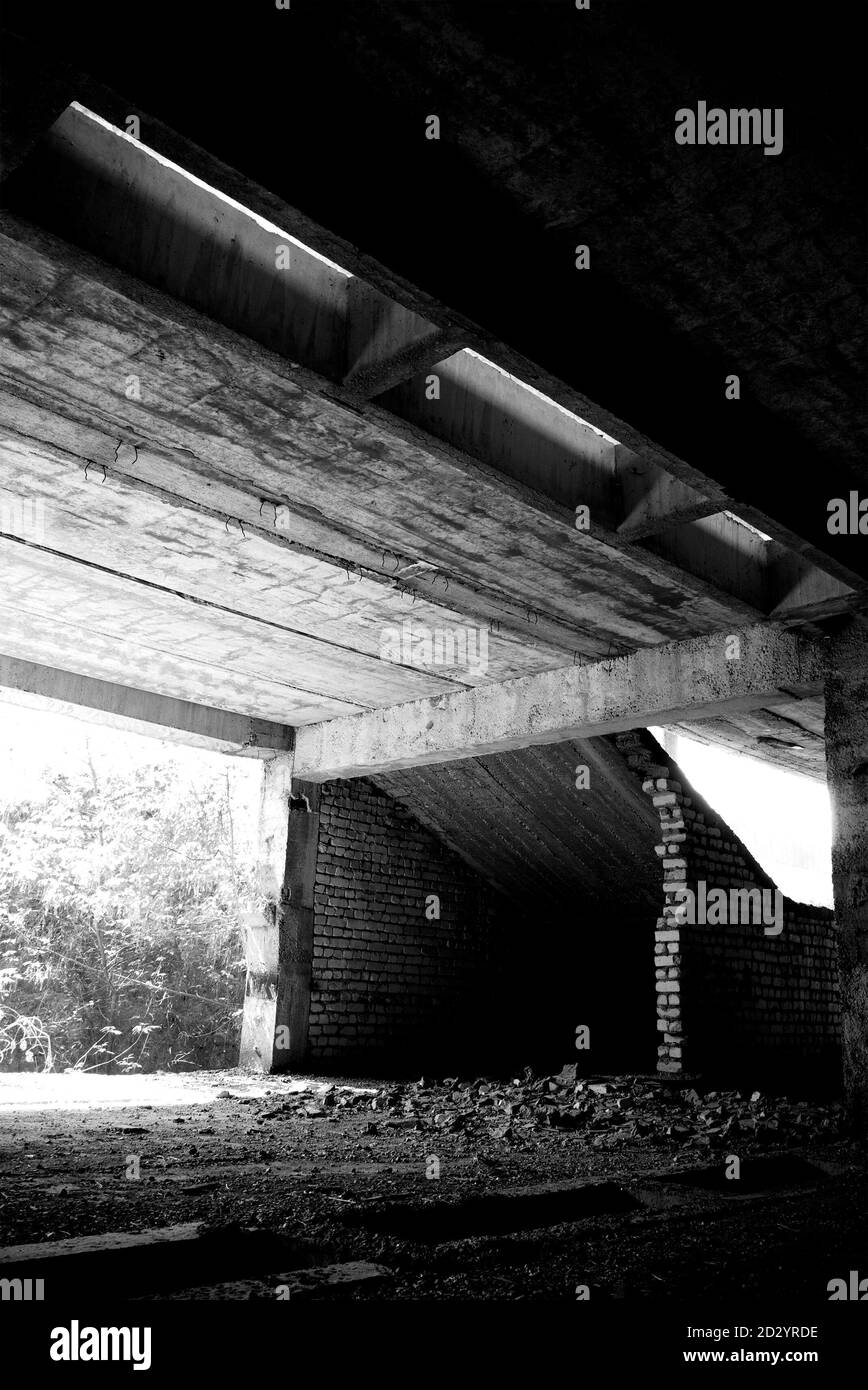 Unfinished and abandoned concrete and brick building. Unfinished ...