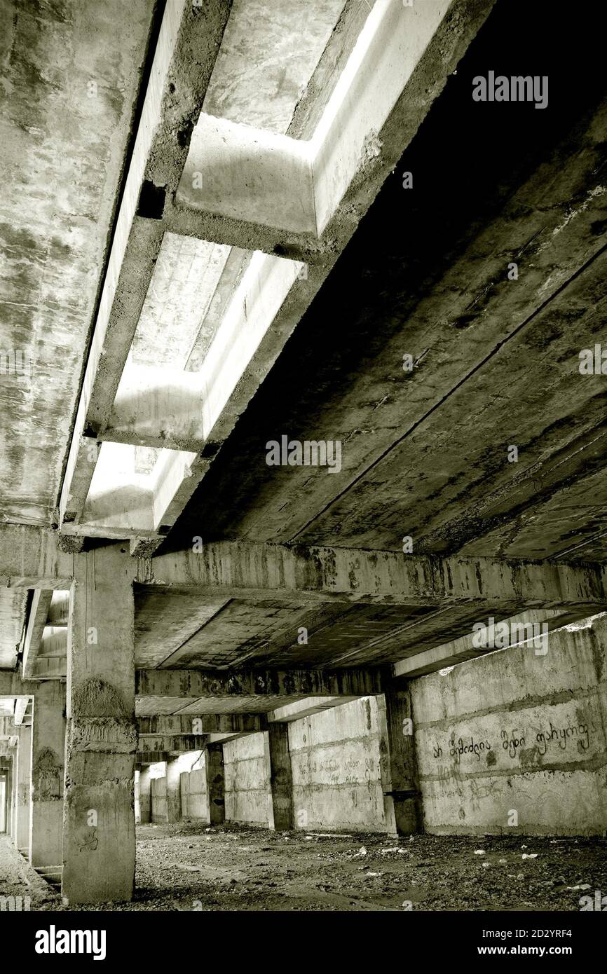 Unfinished and abandoned concrete and brick building. Unfinished ...